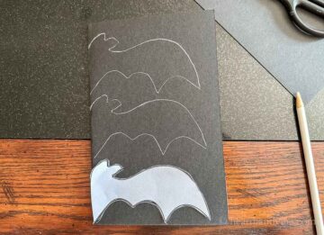 DIY Halloween Bat Decorations Flying Around a Full Moon