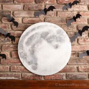 DIY Halloween Bat Decorations Flying Around a Full Moon